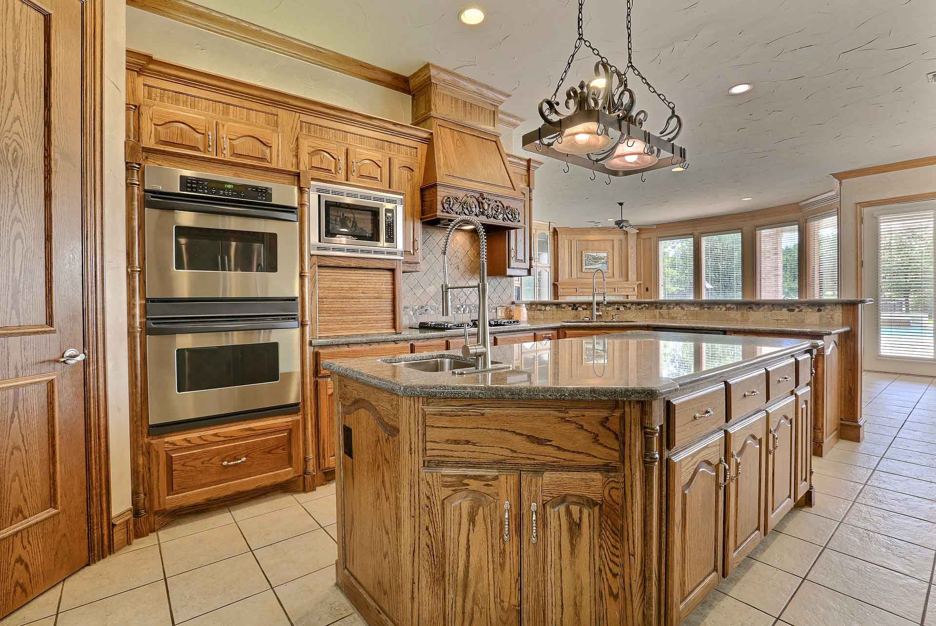 Know how to Design a Kitchen with a wooden theme - Aastitva